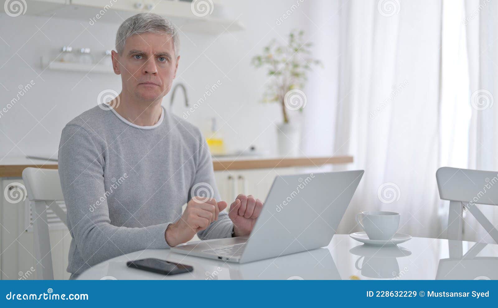 Serious Old Man with Laptop Looking at the Camera Stock Image - Image ...