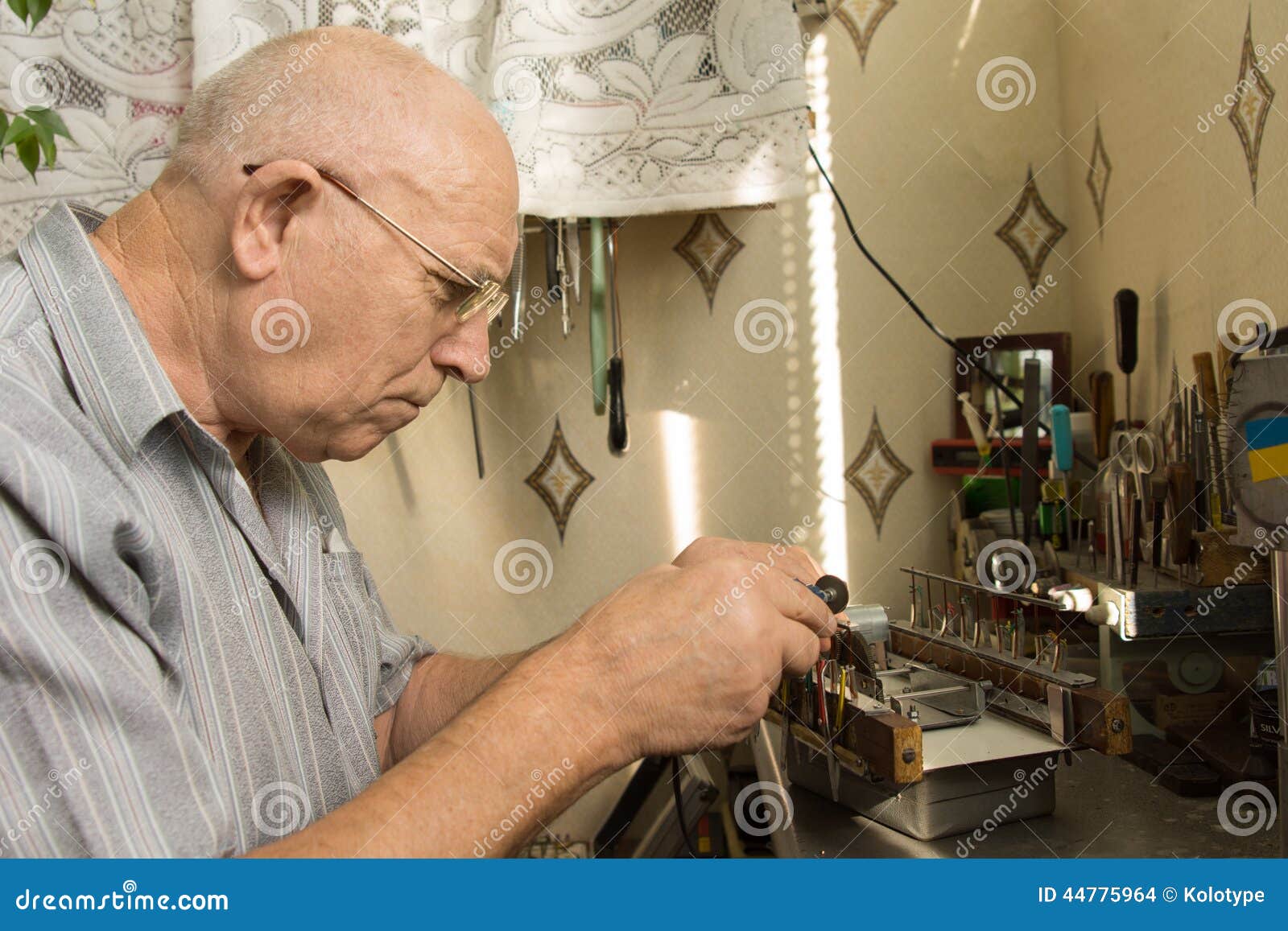 Serious Old Man Working for Electronic Device Stock Photo - Image of ...