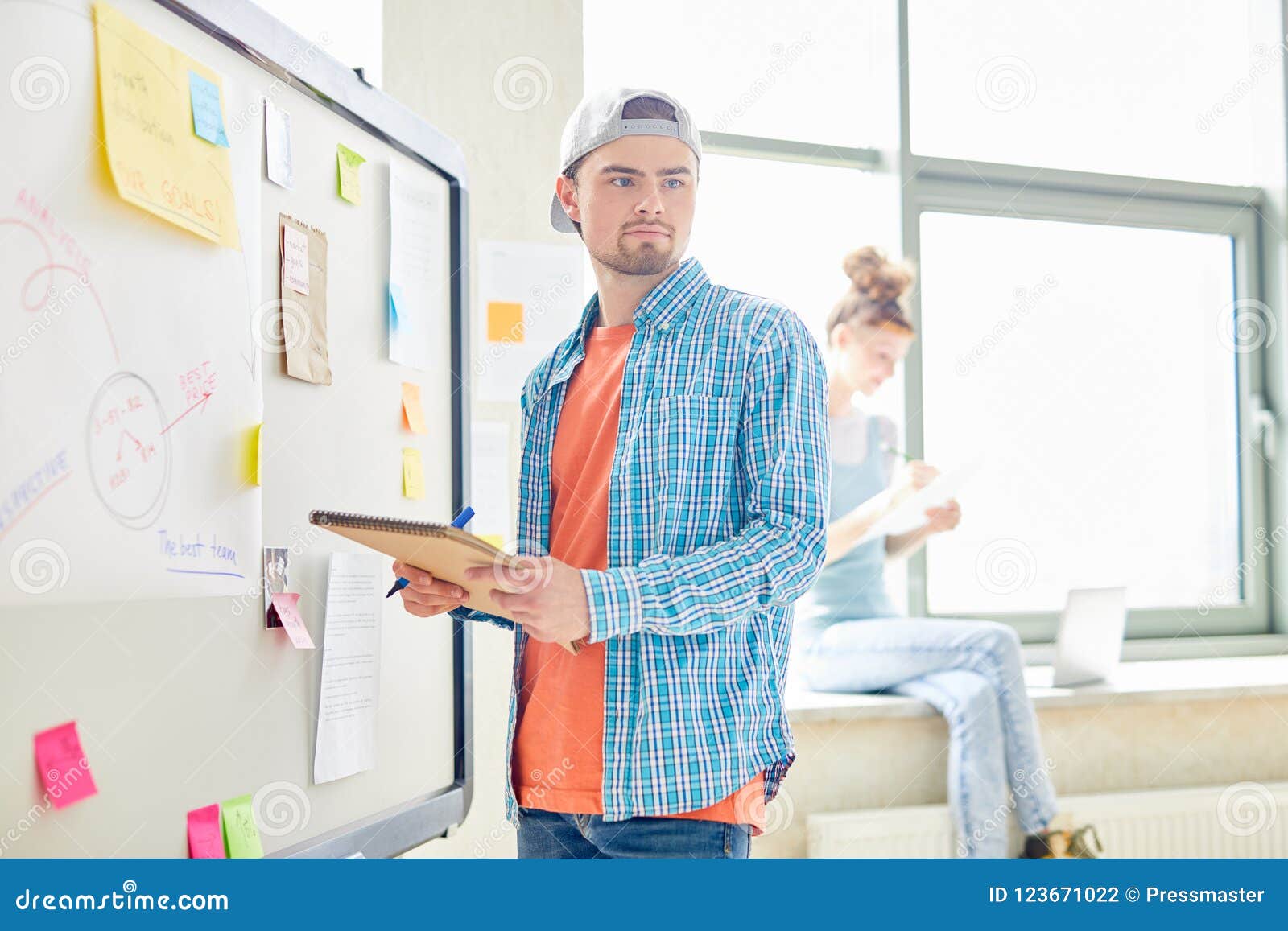 Guy with notepad stock photo. Image of college, adult - 123671022