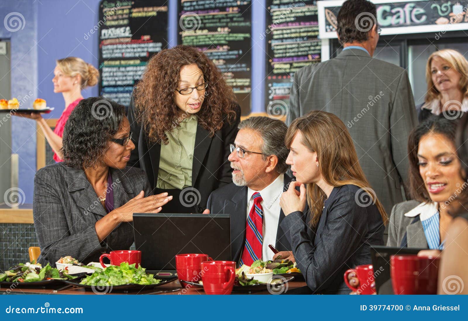 Serious People Talking in Cafe Stock Photo - Image of break, laptop ...
