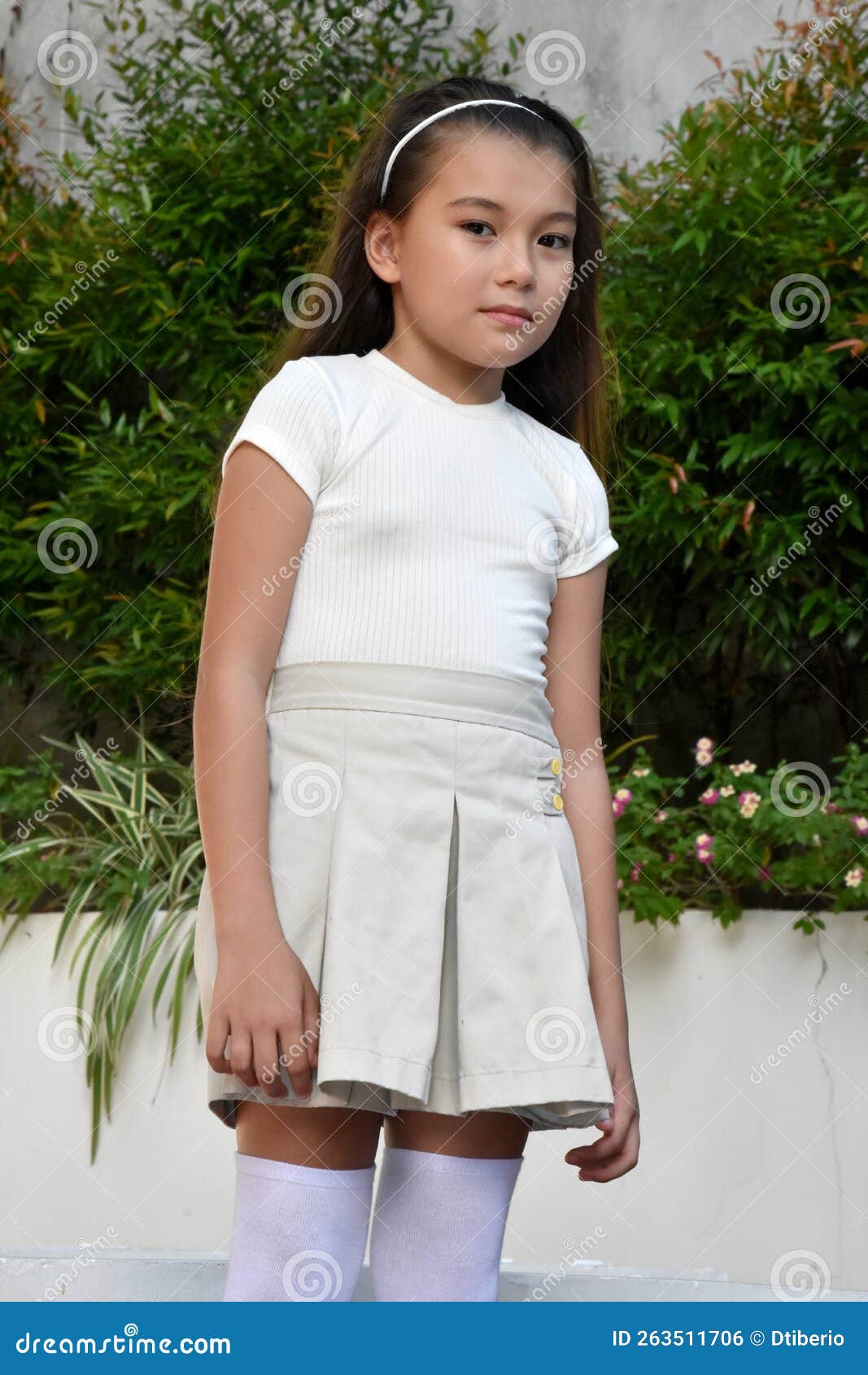 A Serious Petite Philippina Person Stock Photo - Image of apathetic ...