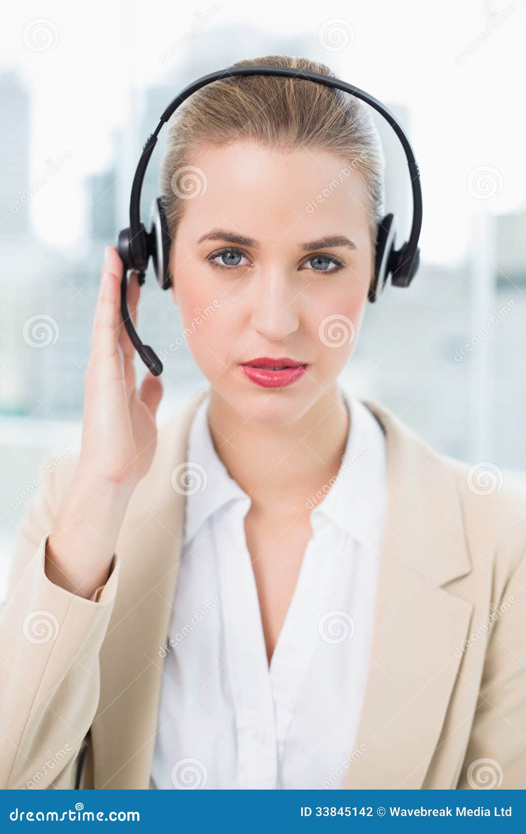 Serious Pretty Call Centre Agent Wearing Headset Stock Photo - Image of ...