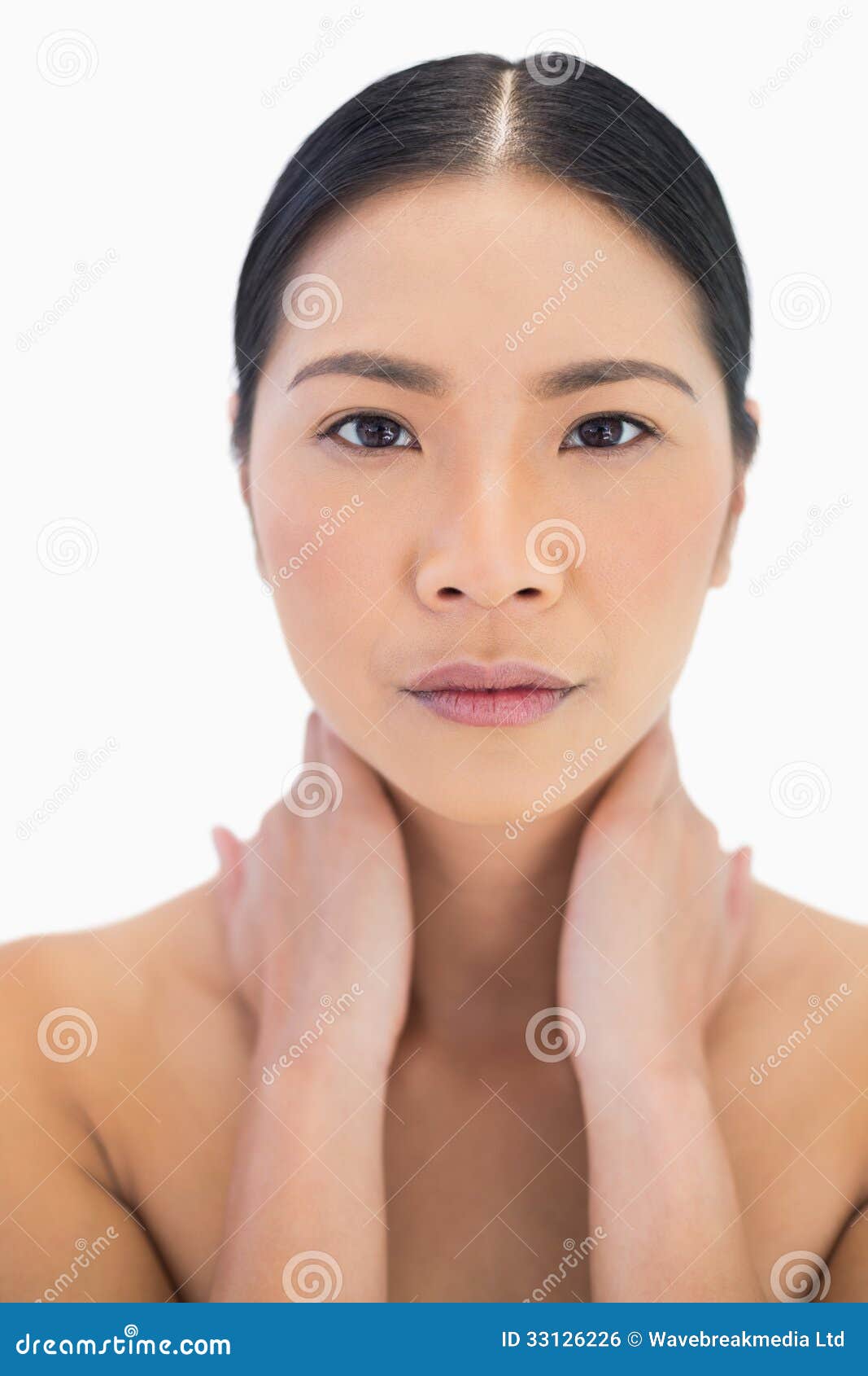 Serious Pretty Natural Model Posing with Hands on Her Neck Stock Photo ...
