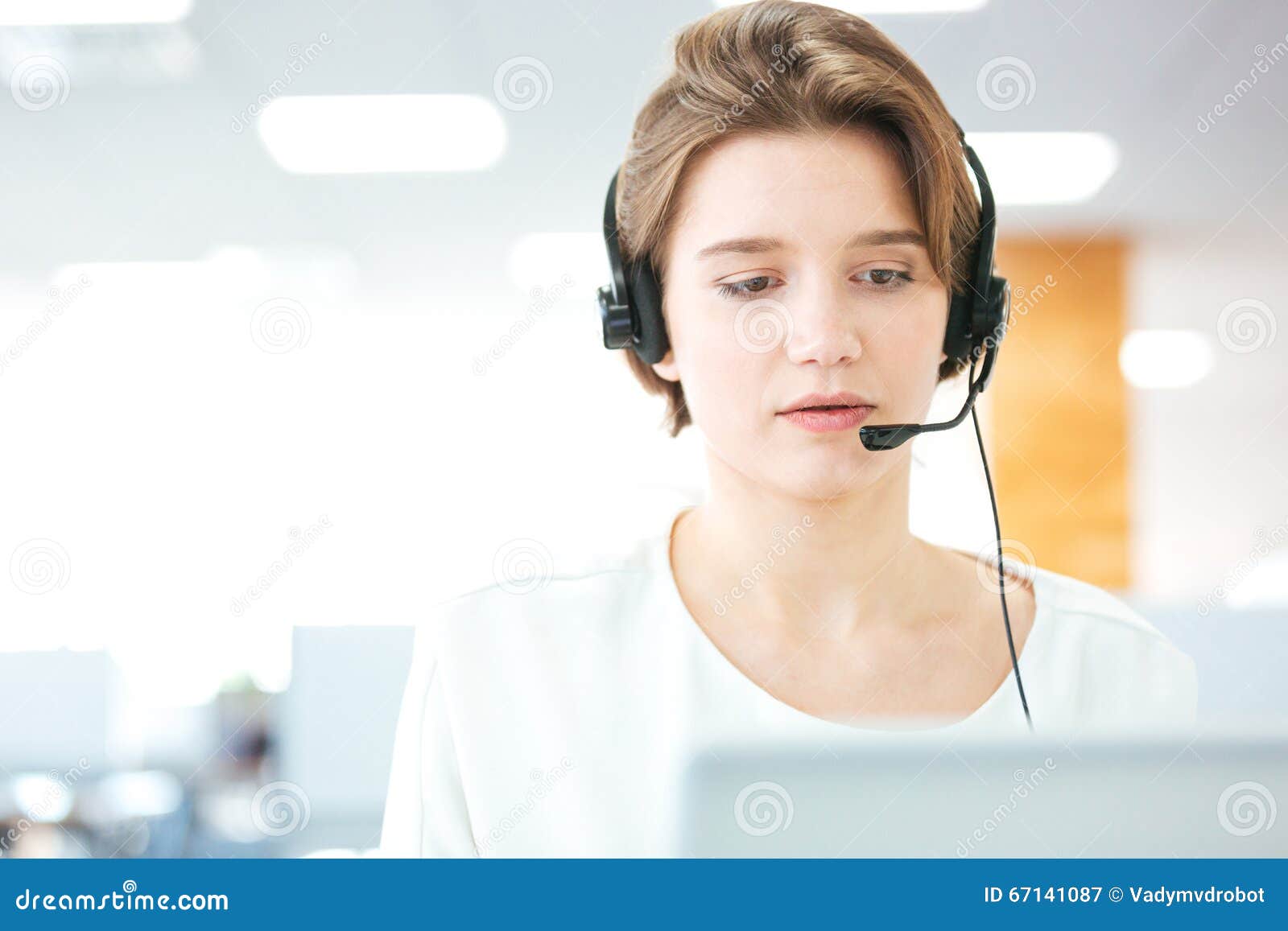 Serious Pretty Young Woman Working As Support Phone Operator Stock ...