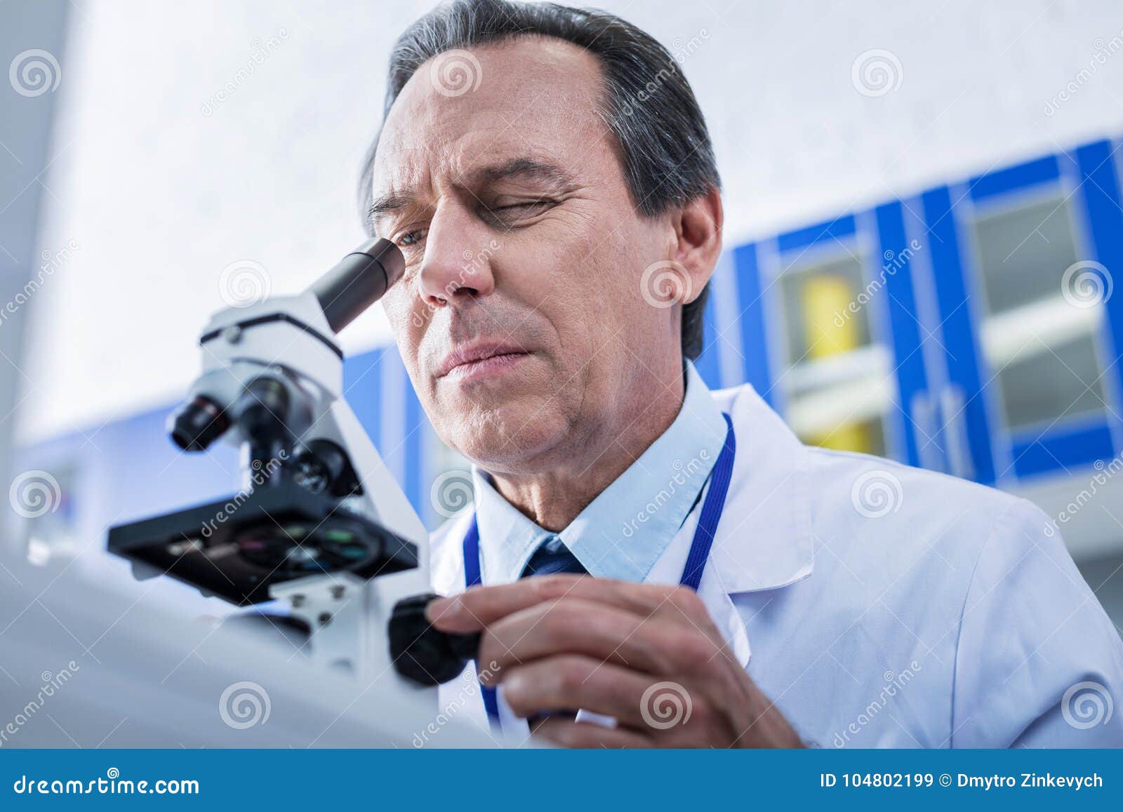 Serious Professional Scientist Looking into the Microscope Stock Image ...