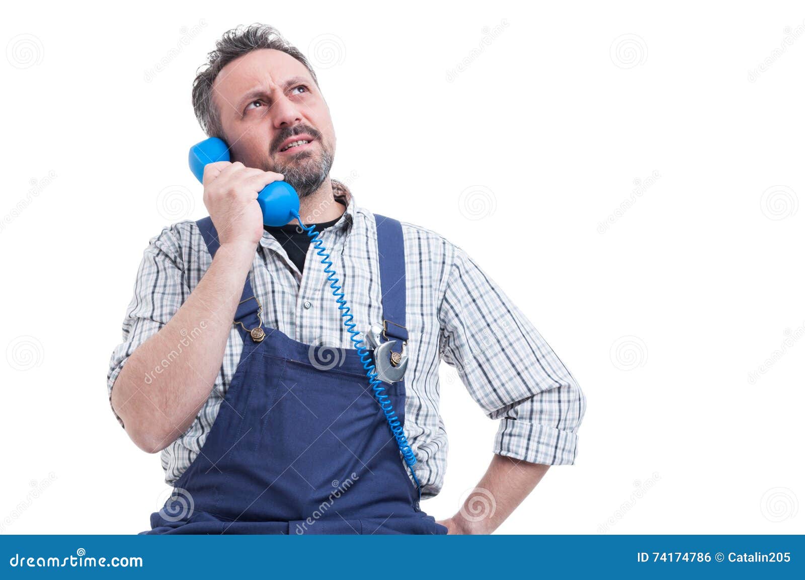 Serious Repairman Solving a Work Problem on Telephone Stock Photo ...