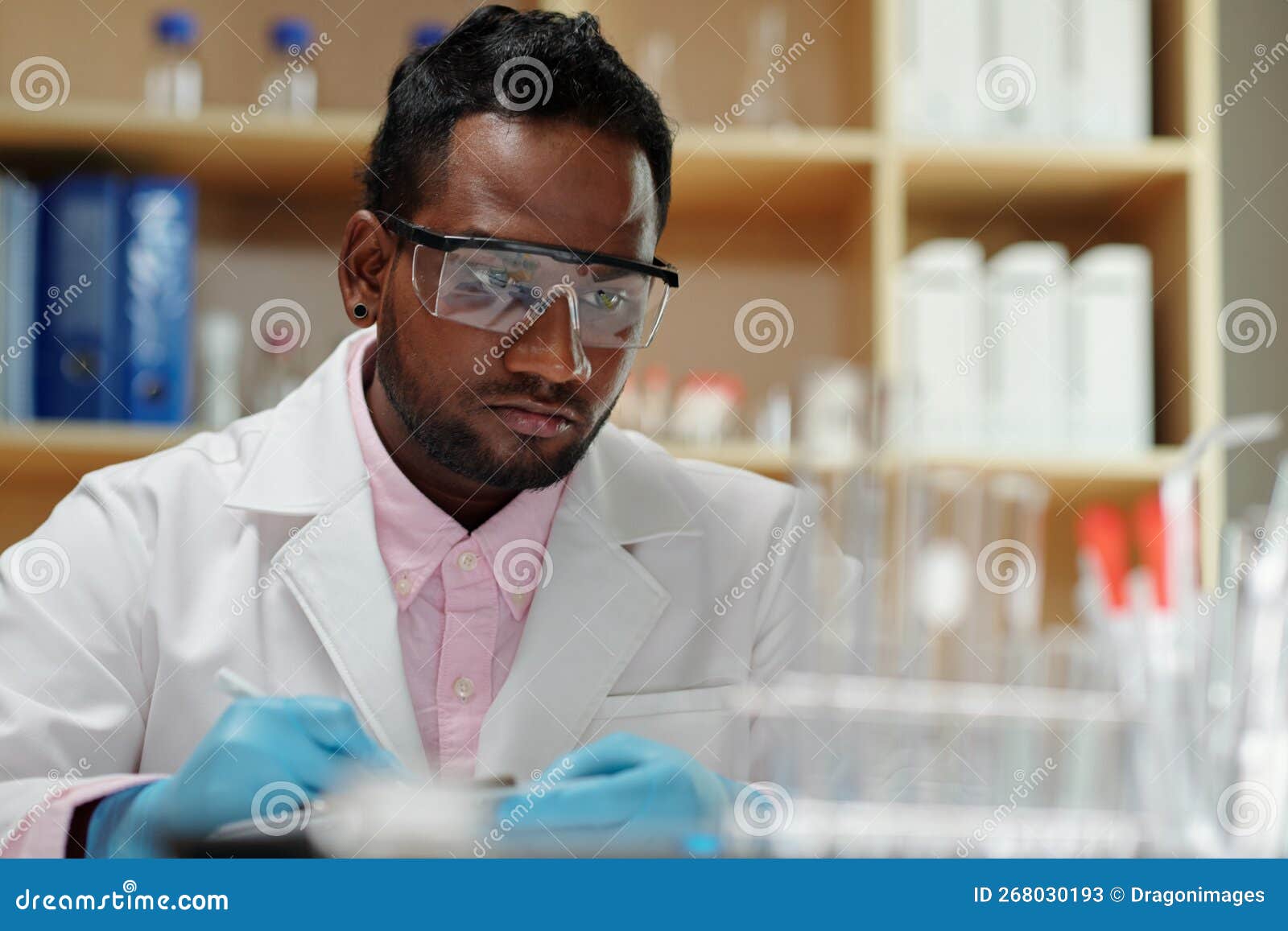 Researcher Checking Reagents Stock Image - Image of microscope ...