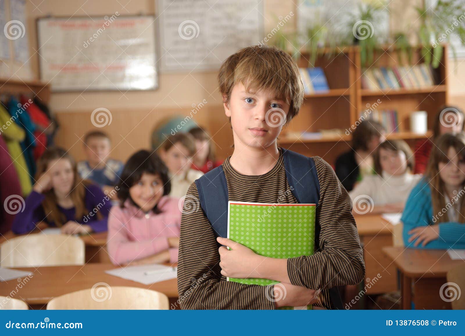 Serious schoolboy stock photo. Image of schoolchild, child - 13876508