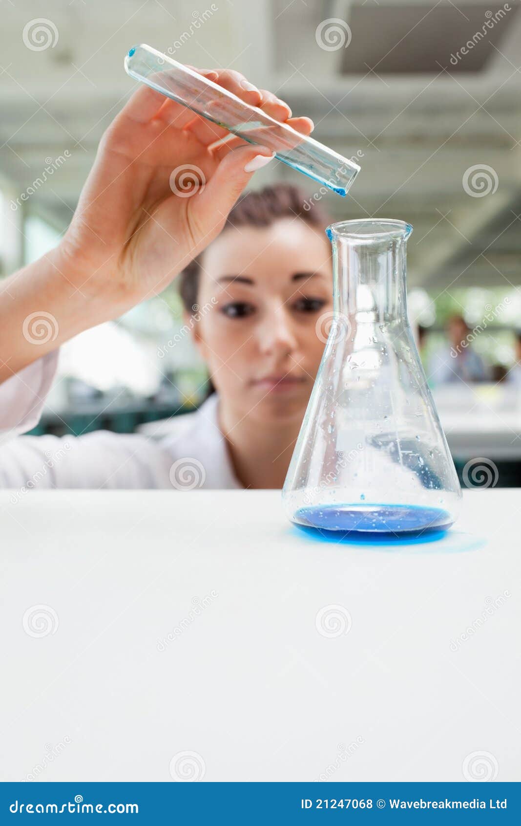 A Serious Science Student Pouring Liquid Stock Photo - Image of ...