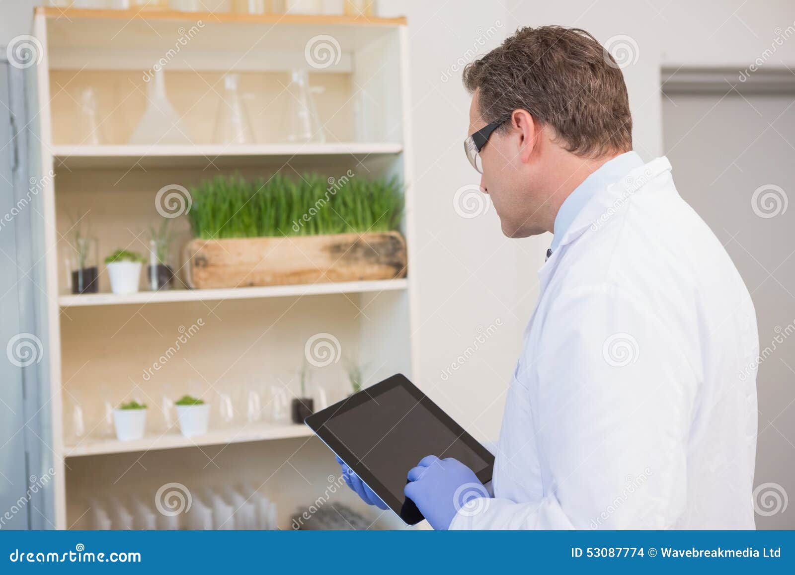 Serious Scientist Using Tablet Pc Stock Photo - Image of protective ... Serious Scientist Using Tablet Pc Stock Photo - Image of protective ...