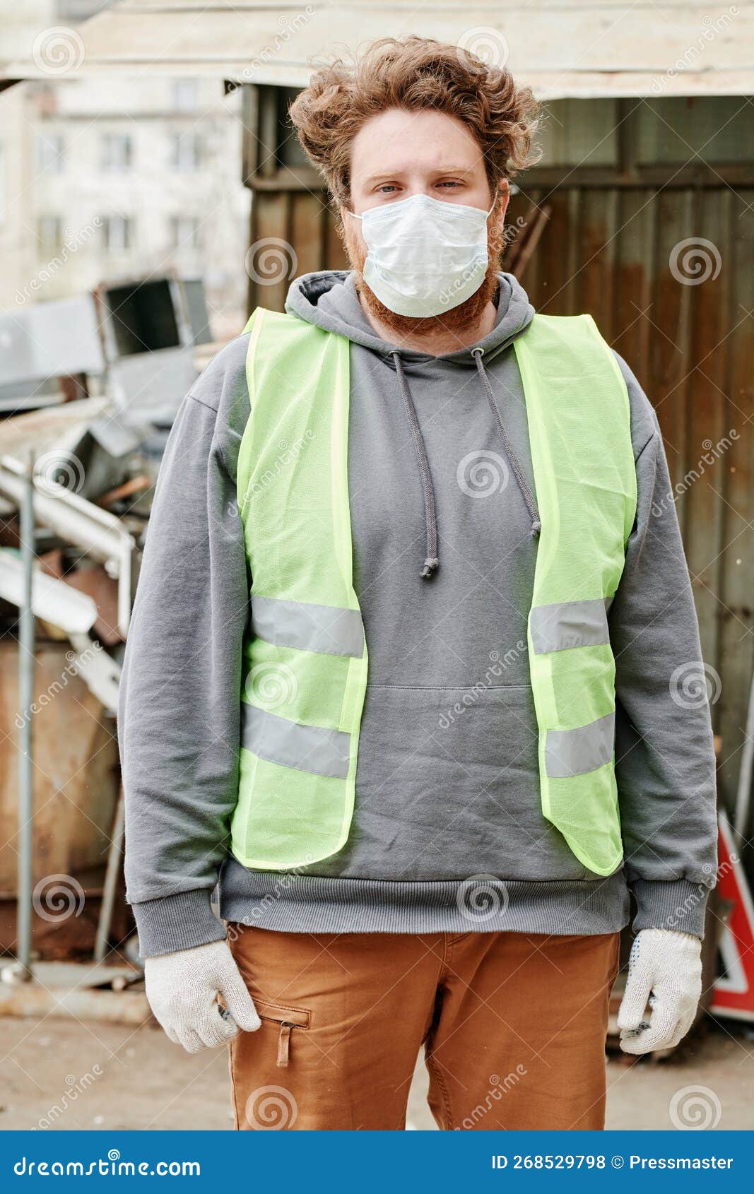Serious Scrapyard Worker stock photo. Image of garbage - 268529798