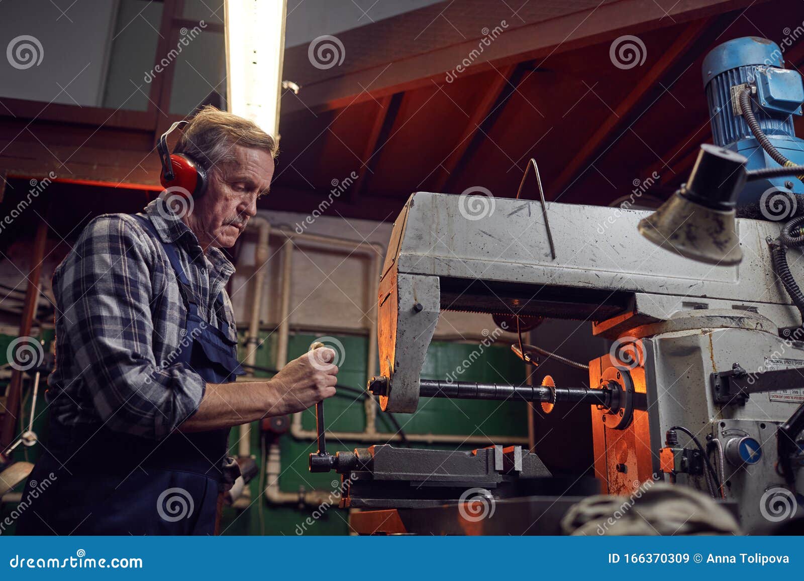 Operator working on lathe stock image. Image of metalwork - 166370309
