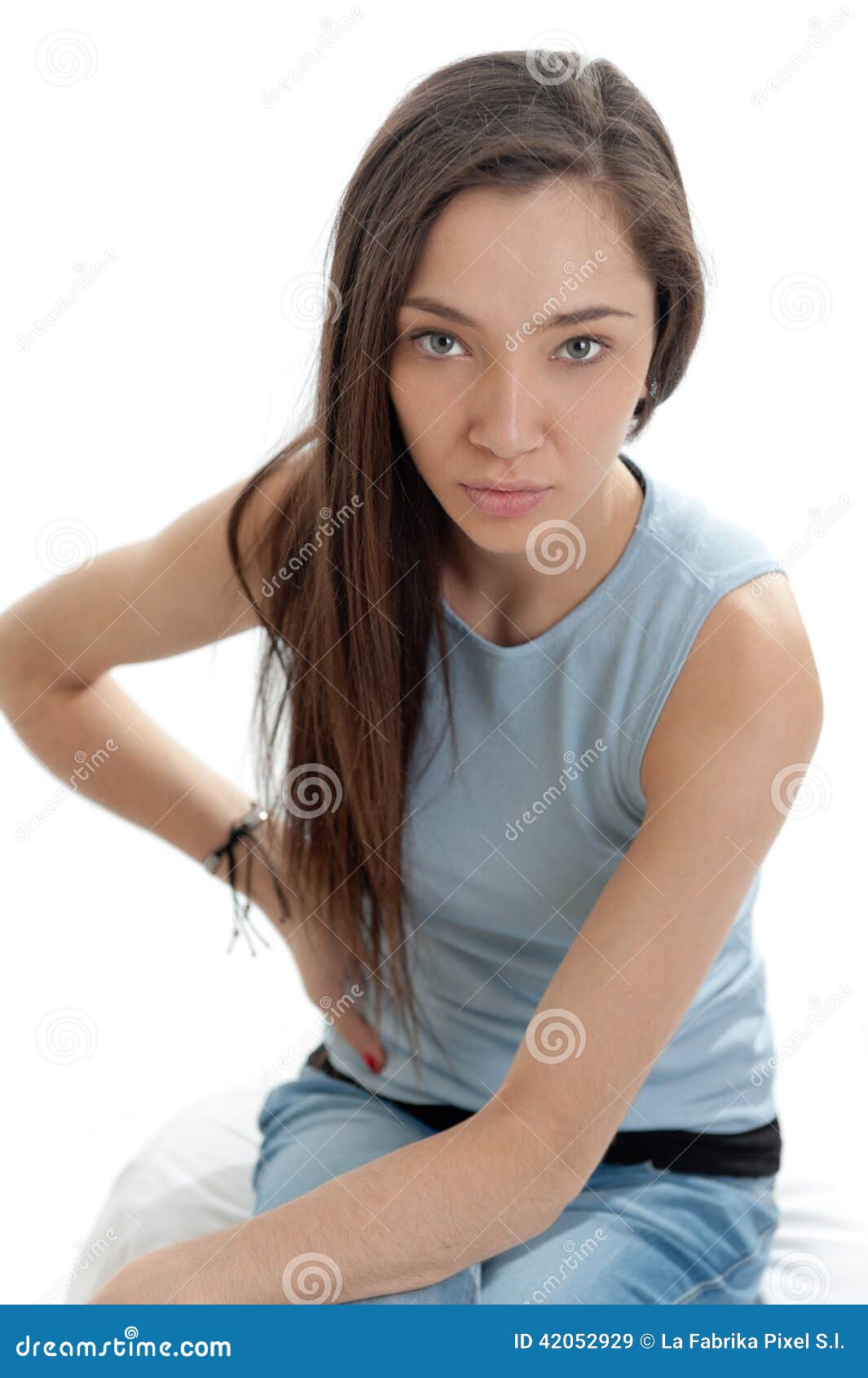 Serious sitting brunette stock image. Image of long, woman - 42052929