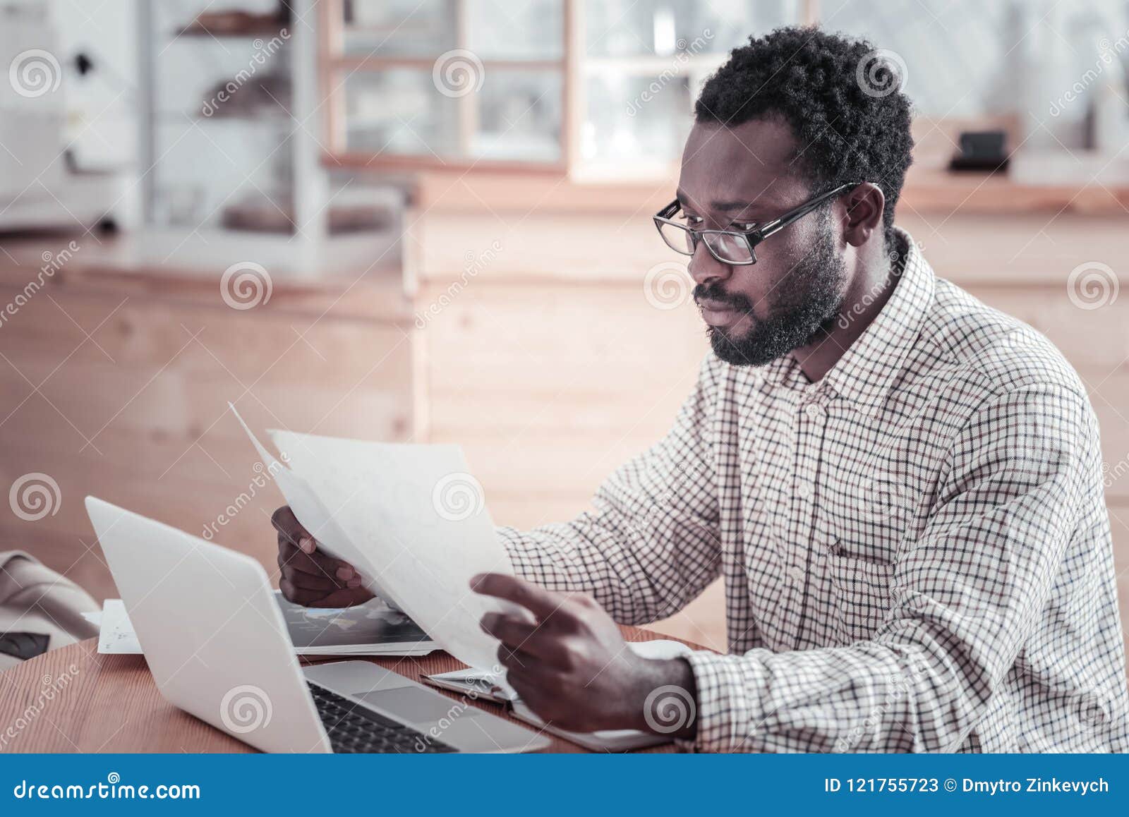 Serious Smart Man Reading Documents Stock Image - Image of ...