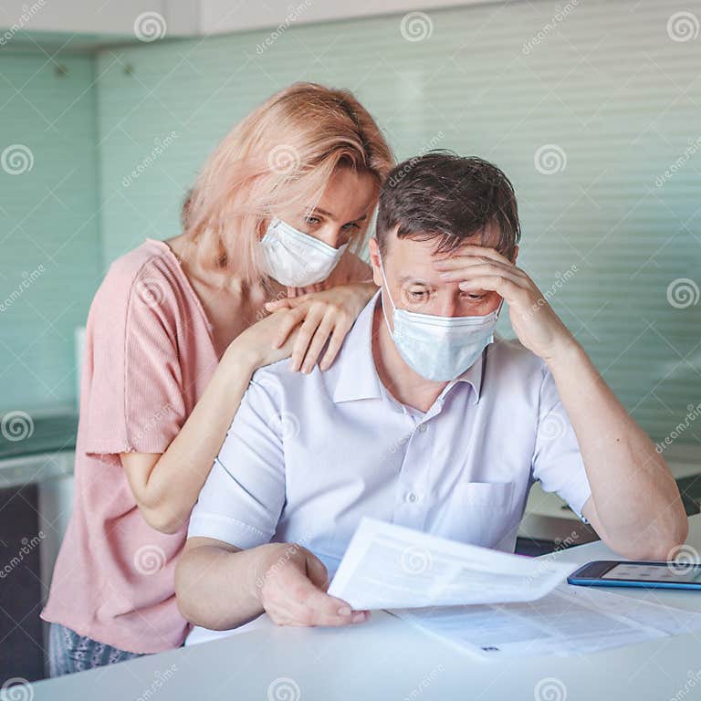 Serious Stressed Couple Worried About Unpaid Bank Debt Calculate Bills