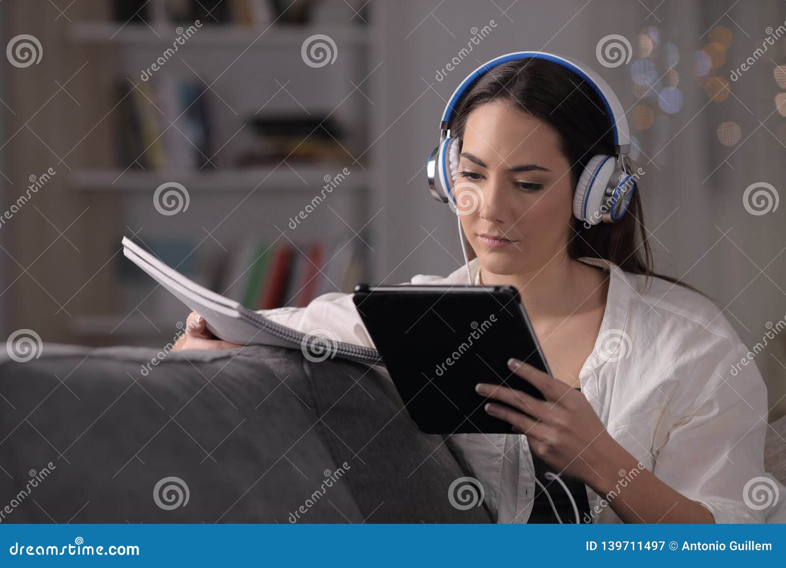 Serious Student E-learning Comparing Notes in the Night Stock Image ...