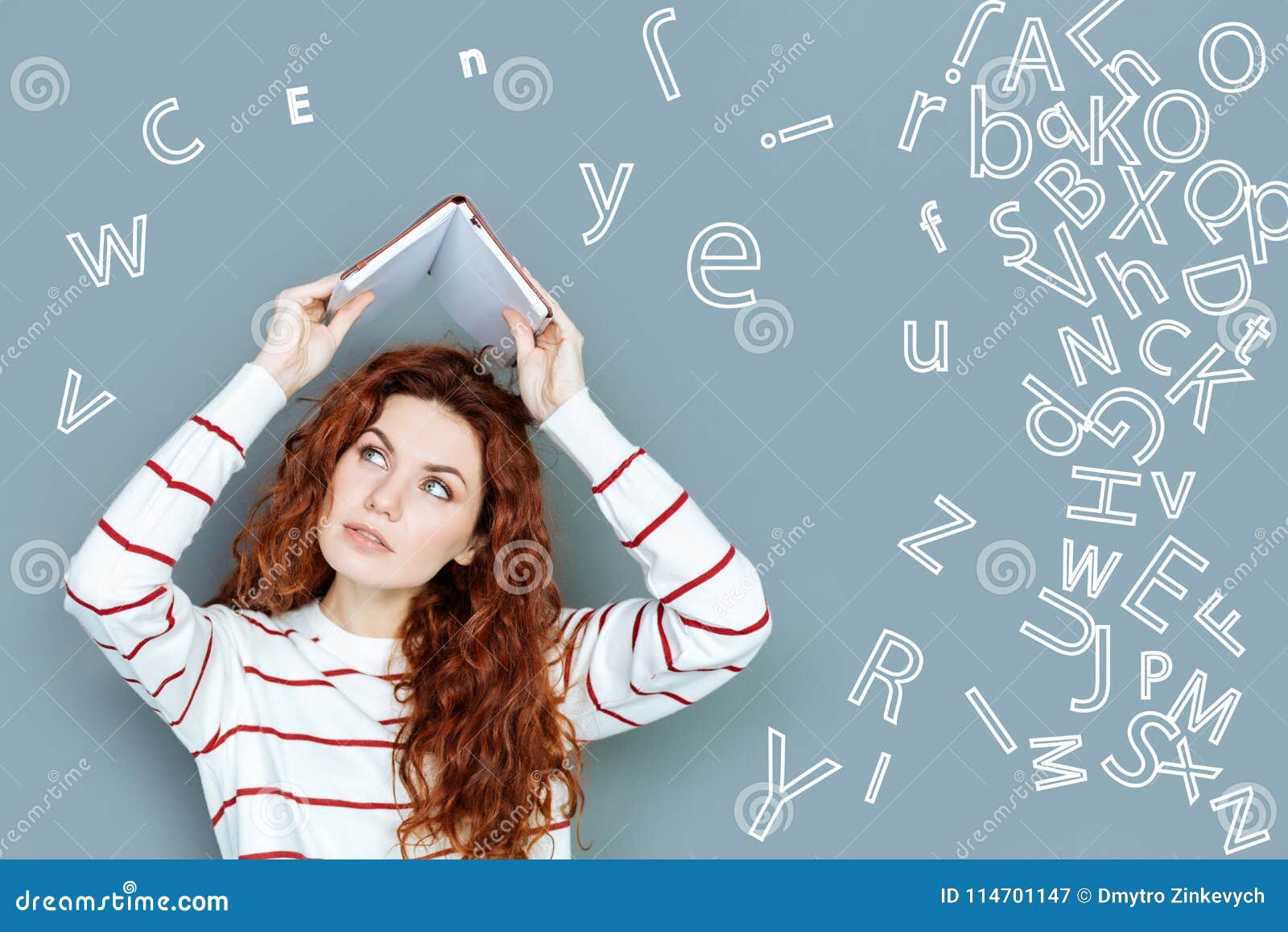 Serious Student Holding a Notebook and Looking Tired of Learning ...