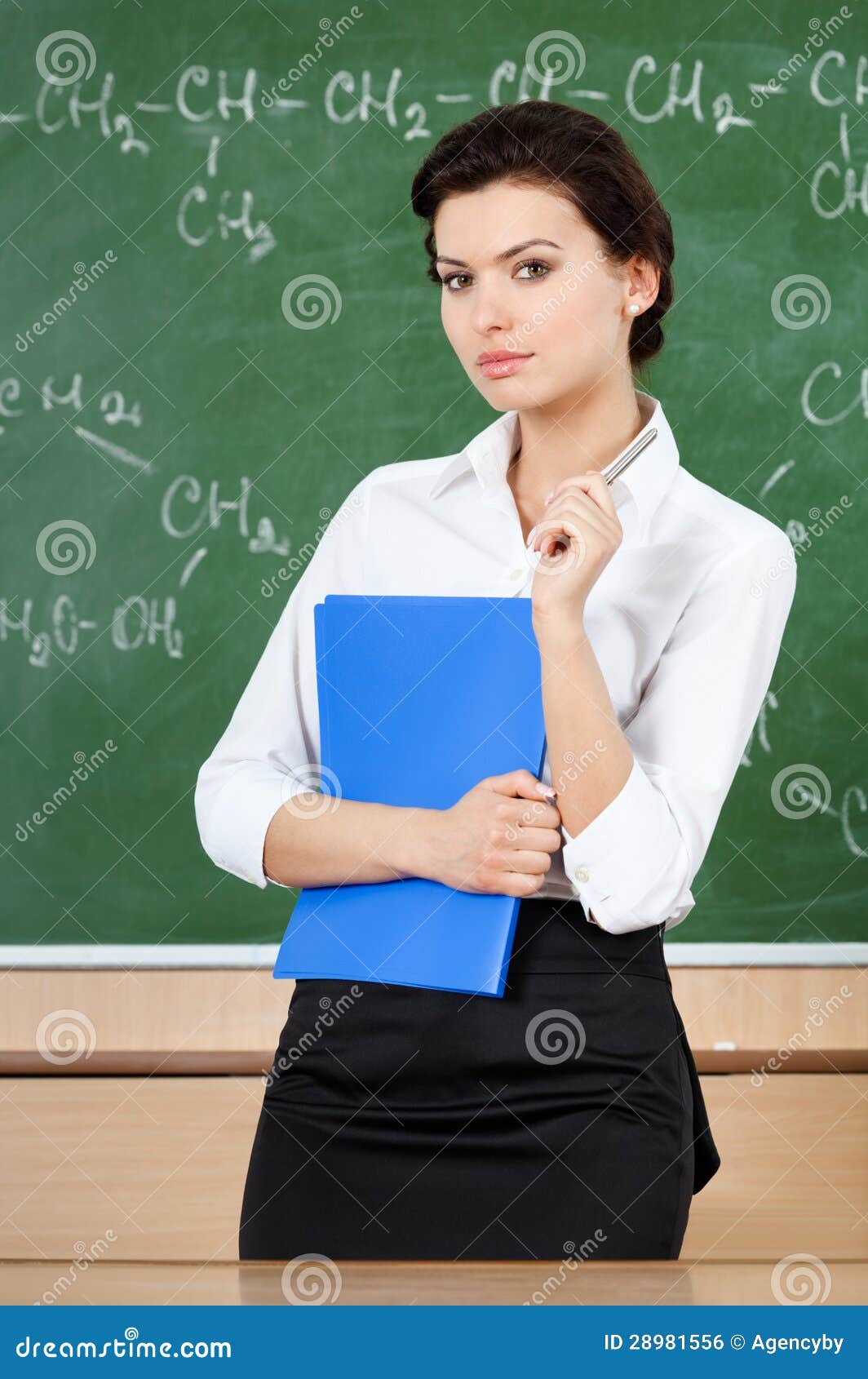 Serious Teacher at the Blackboard Stock Photo - Image of caucasian ...