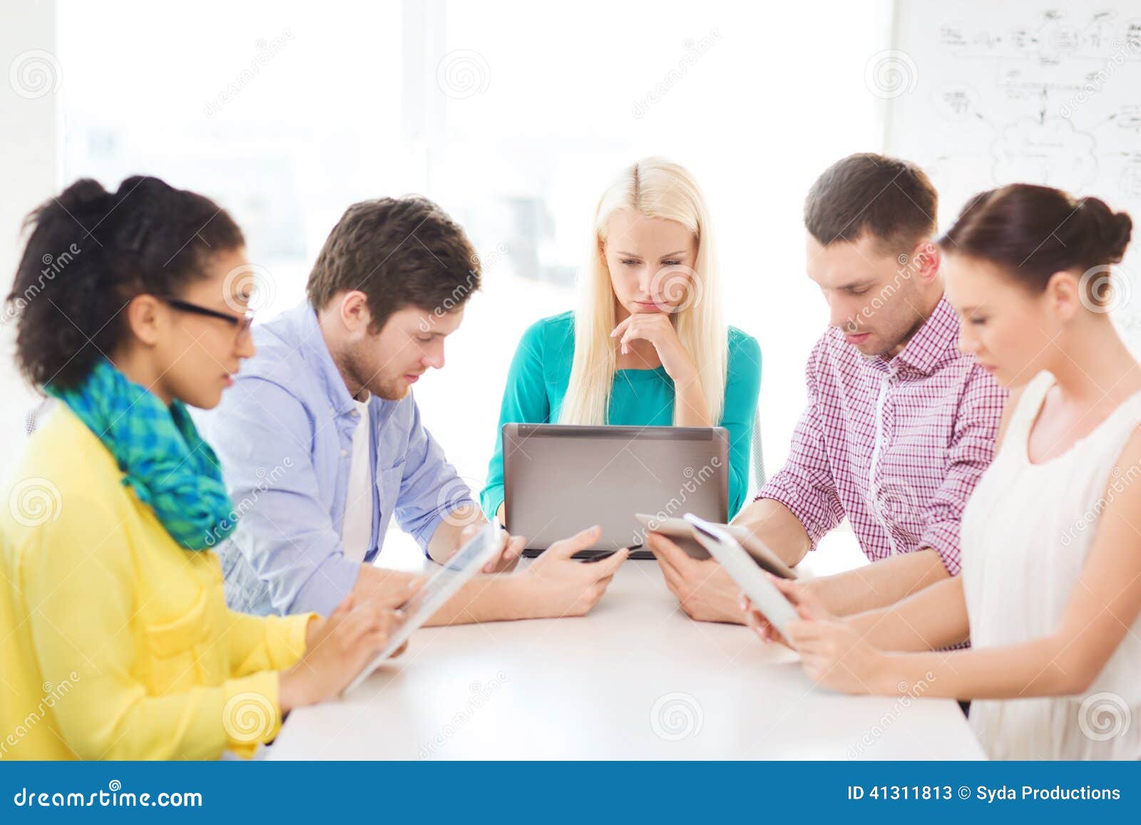 Serious Team with Table Pc and Laptop in Office Stock Image - Image of ...