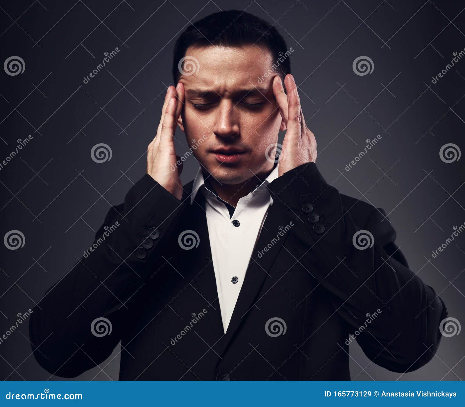 Serious Thinking Man with Thought-transference Abilities Holding the ...