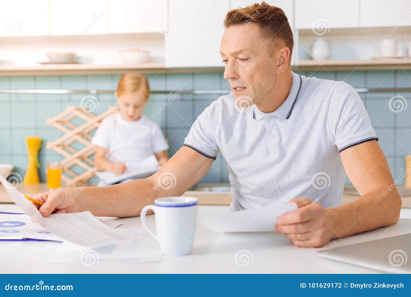 Serious Unhappy Man Reading a Document Stock Photo - Image of caucasian ...