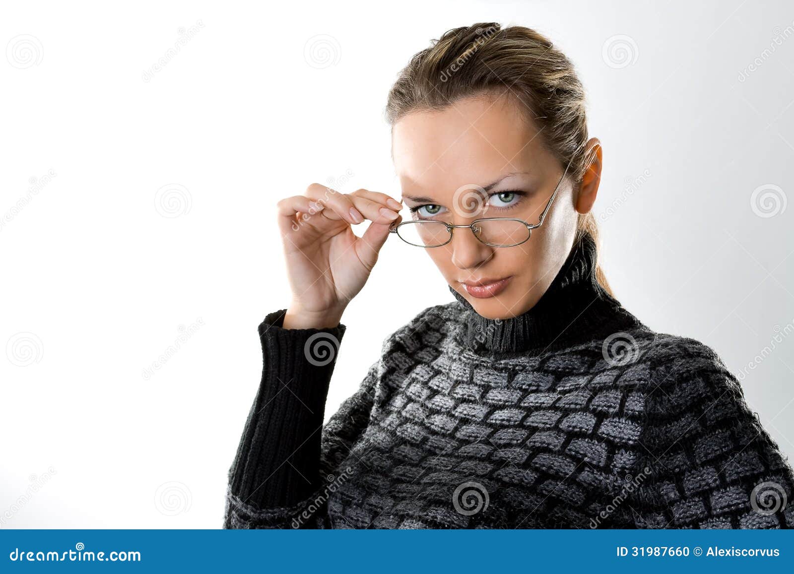 Serious Woman Looking Over Glasses Stock Photo - Image of head, modern ...
