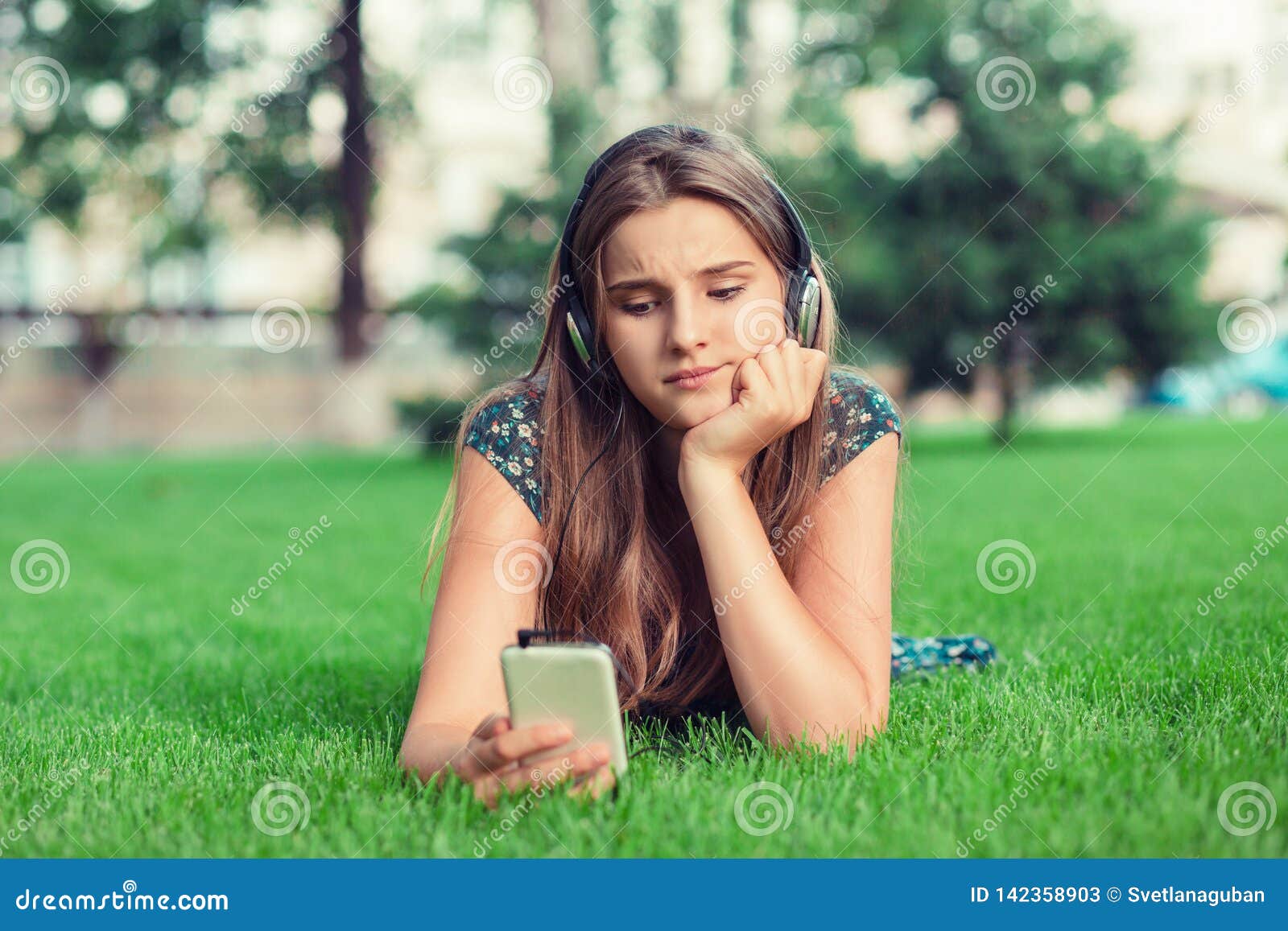 Serious Woman Texting on Phone Displeased Bored Worried with ... Serious Woman Texting on Phone Displeased Bored Worried with ...