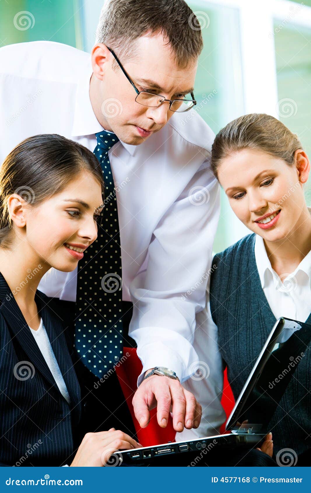 Serious work stock photo. Image of corporate, laptop, friends - 4577168