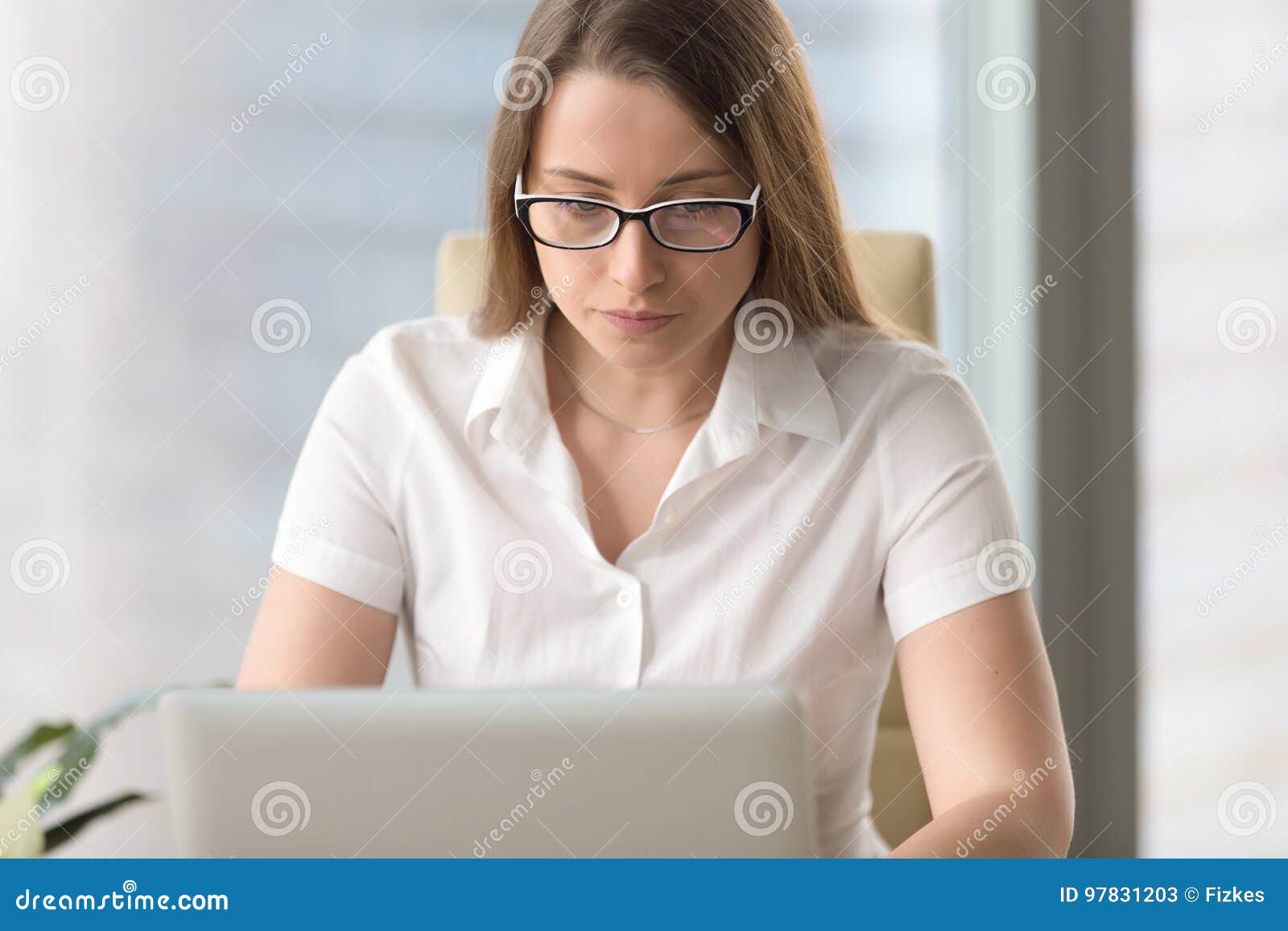 Serious Worried Businesswoman Working on Laptop, Looking at Scre Stock ...