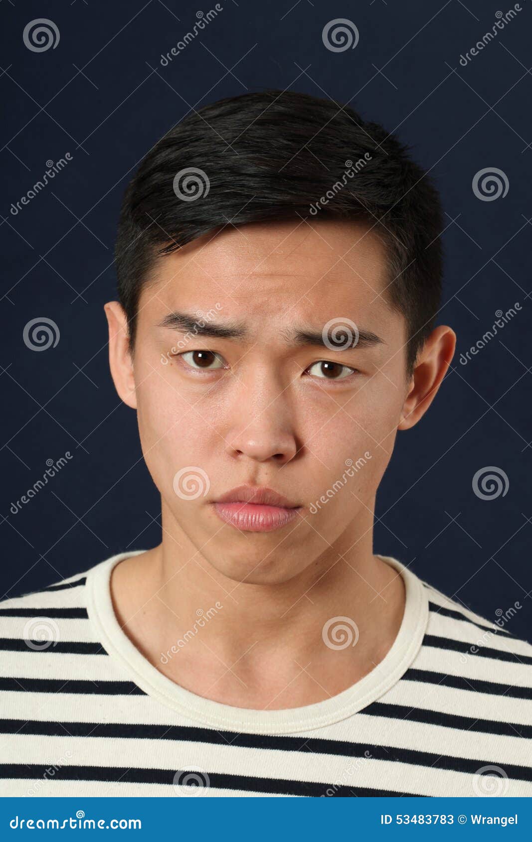 Serious Young Asian Man Looking at Camera Stock Image - Image of ...