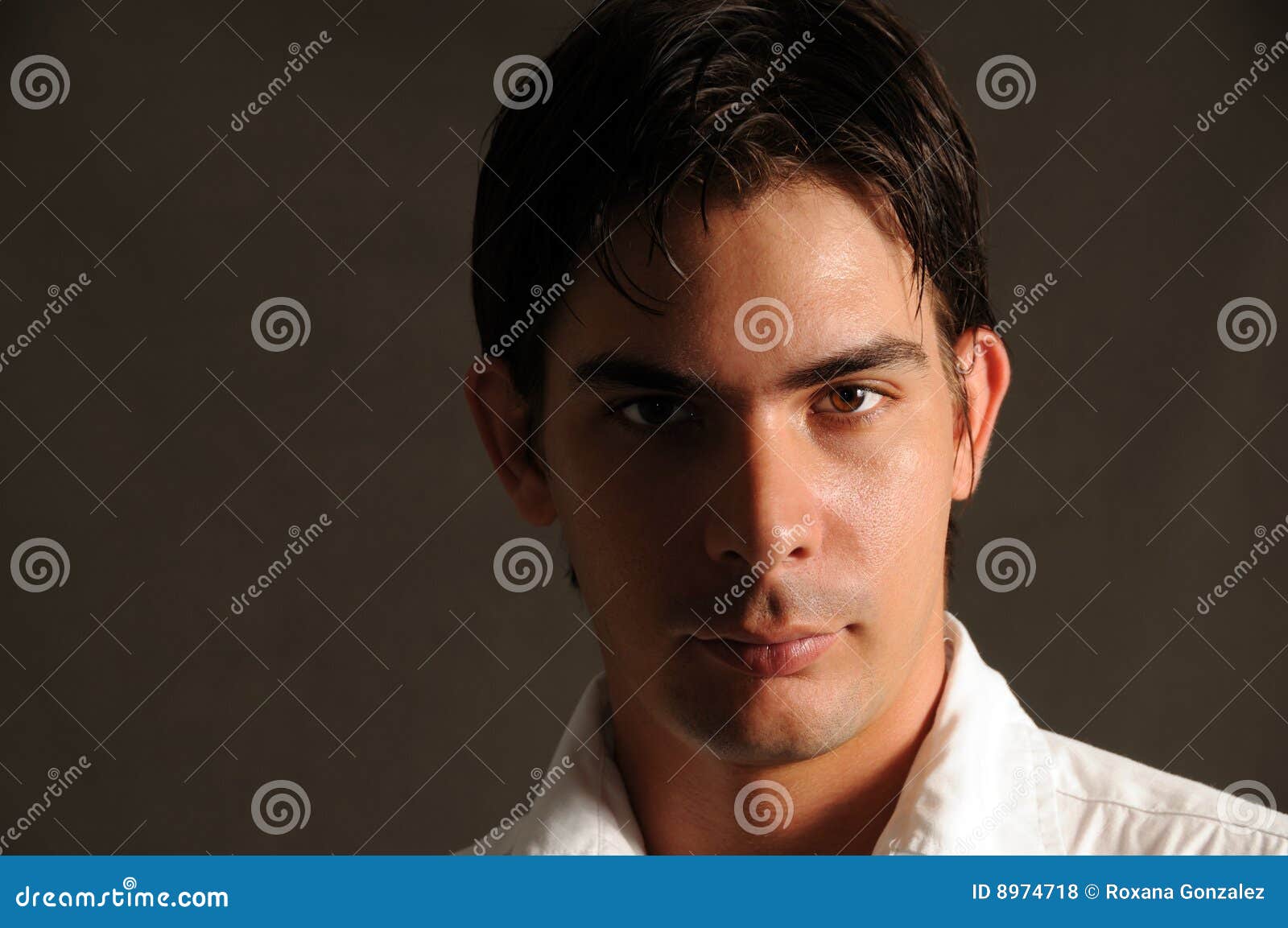 Serious young man stock photo. Image of hispanic, adult - 8974718