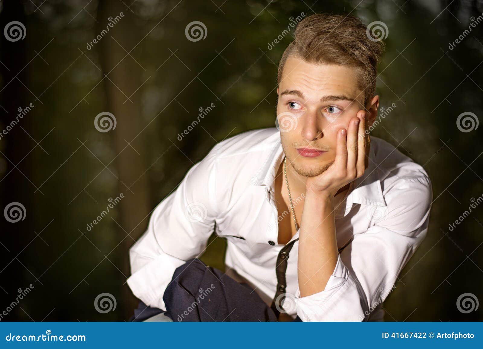 Serious Young Man Outdoors in Park at Night Stock Photo - Image of ...