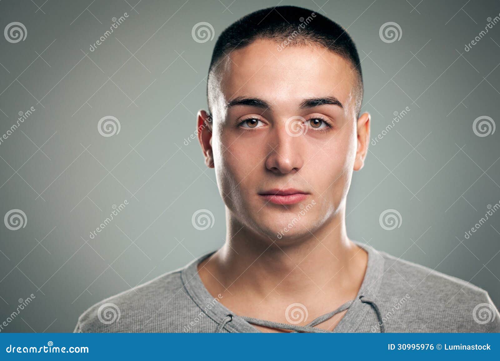 Serious Young Man stock photo. Image of eyes, closeup - 30995976
