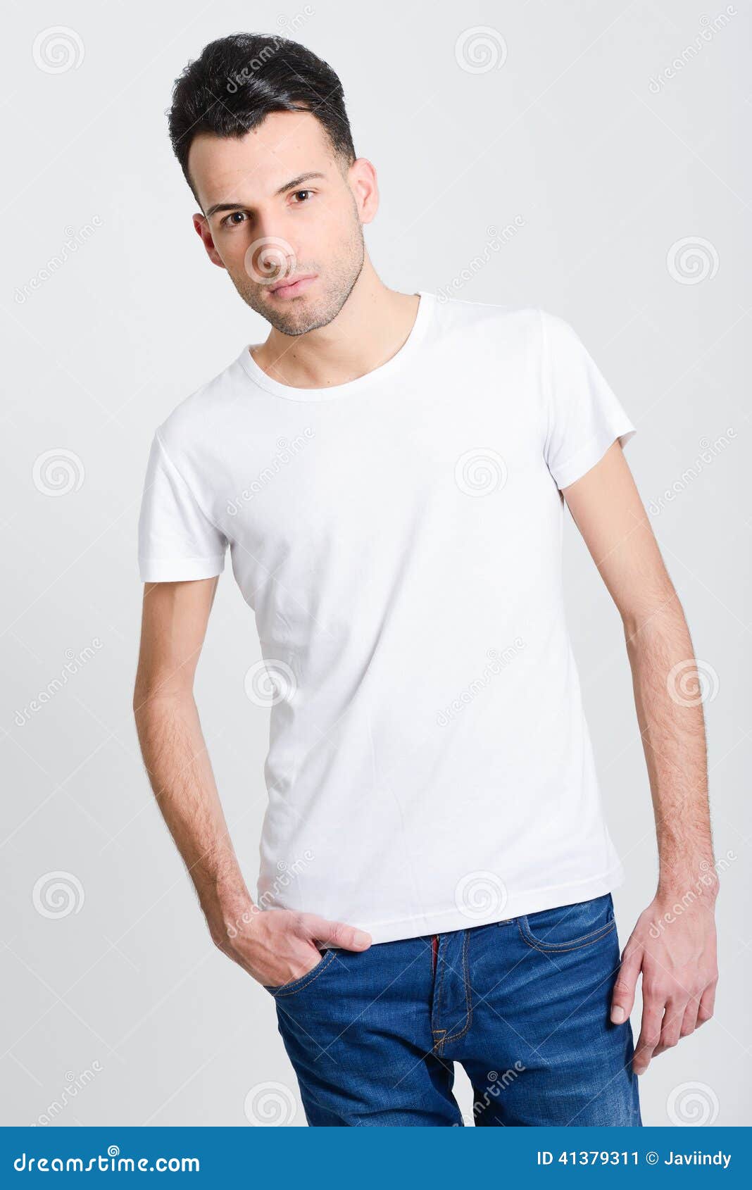 Serious Young Man Standing Against White Background Stock Image - Image ...