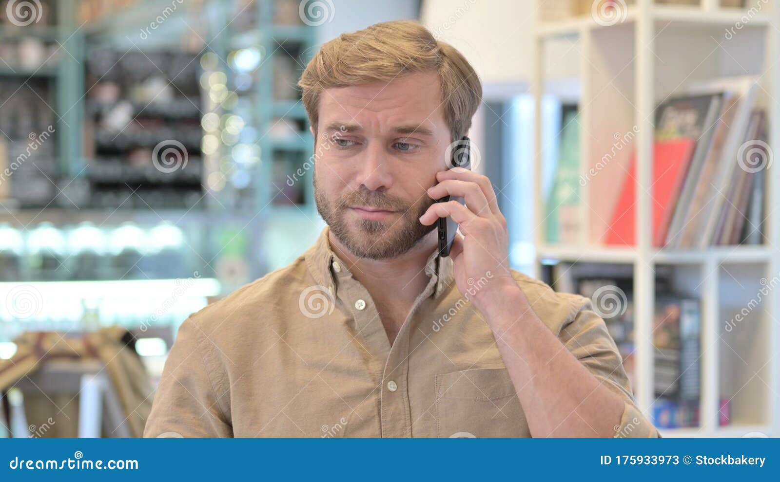 Serious Young Man Talking on Smartphone, Listening Stock Image - Image ...
