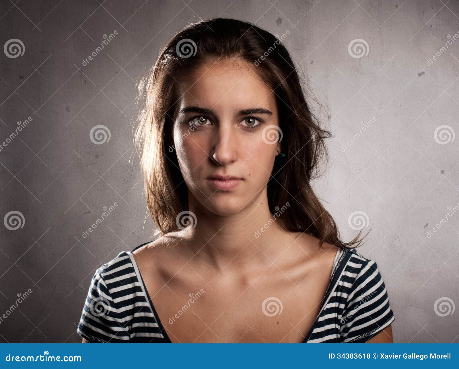 Serious young woman stock photo. Image of emotion, face - 34383618