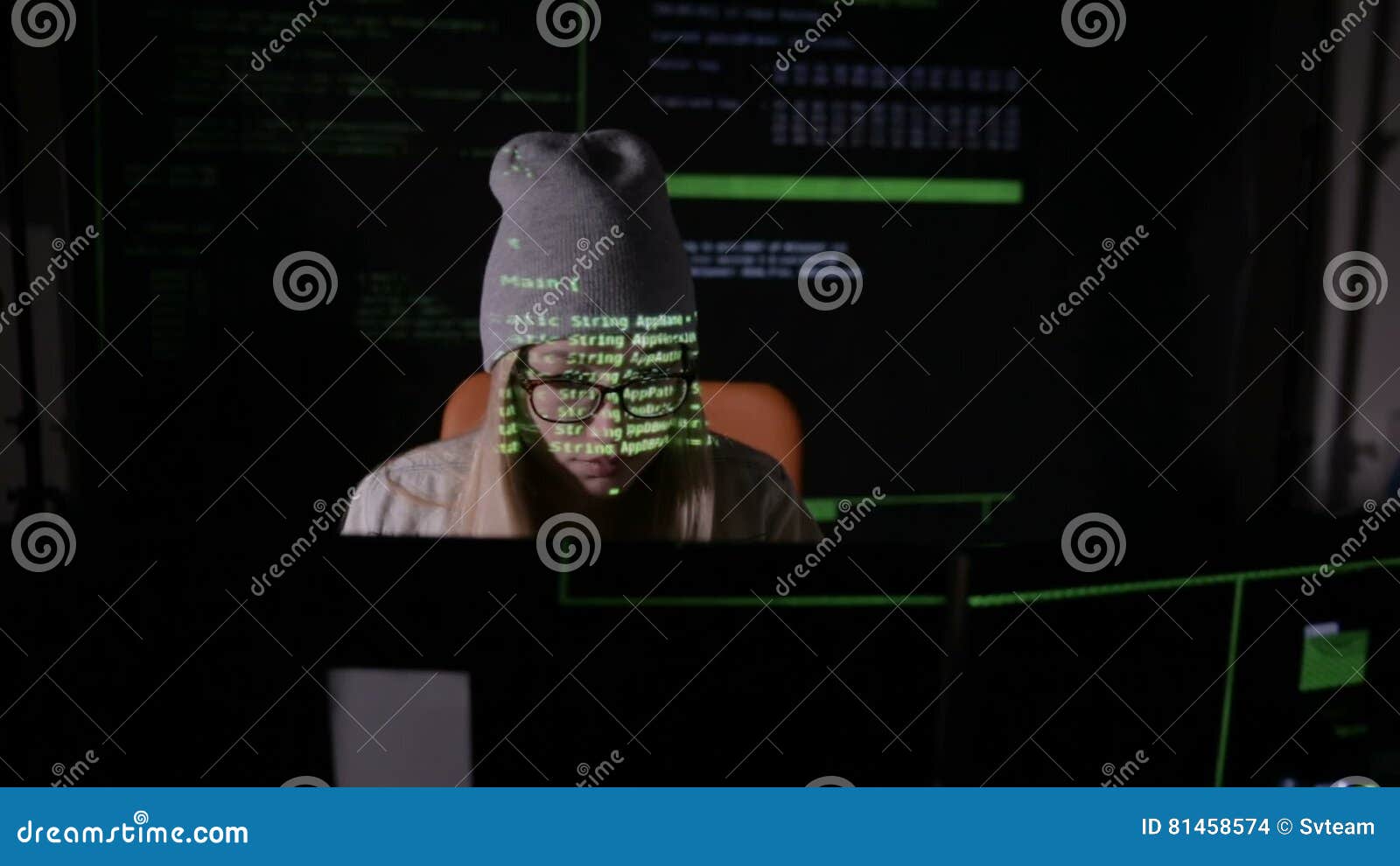 Serious Young Woman Using Computer at Night in Dark Room. Computer Code ...