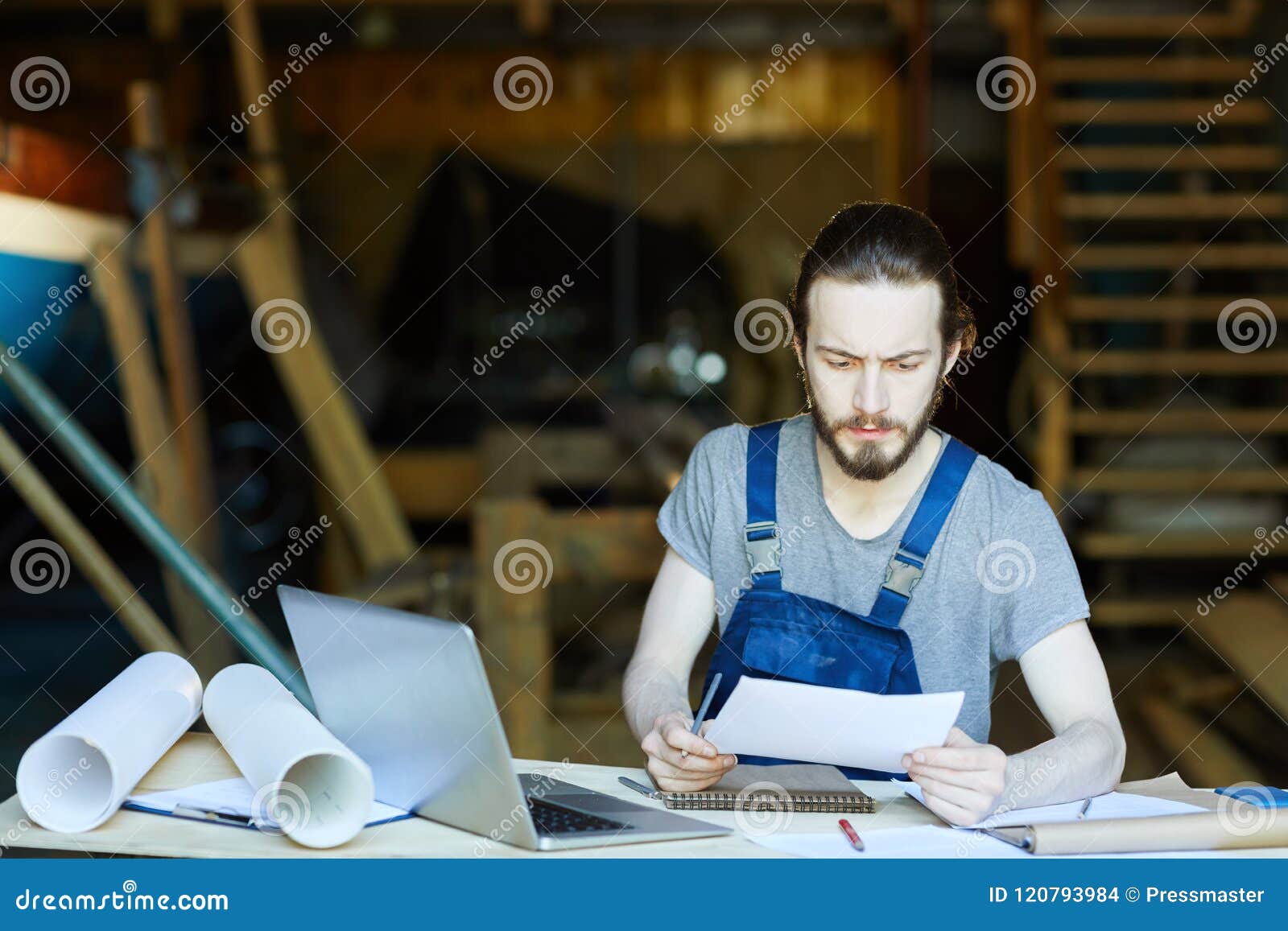 Engineer reading paper stock photo. Image of businessman - 120793984