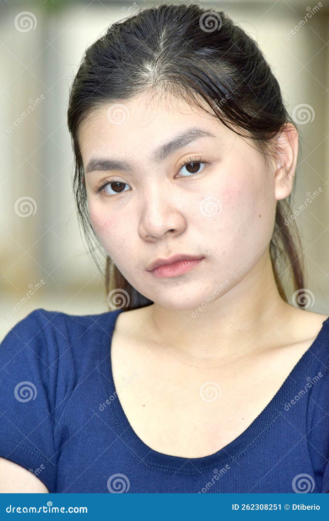 A Serious Youthful Chinese Female Stock Image - Image of reticent ...