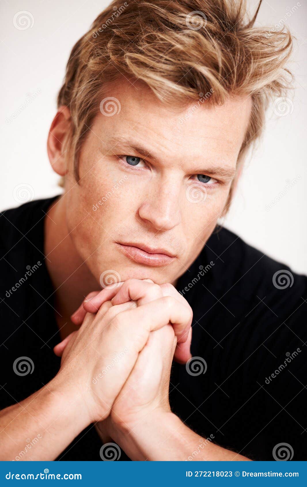 Seriously Stern. Portrait of a Handsome Young Man Posing in Studio ...
