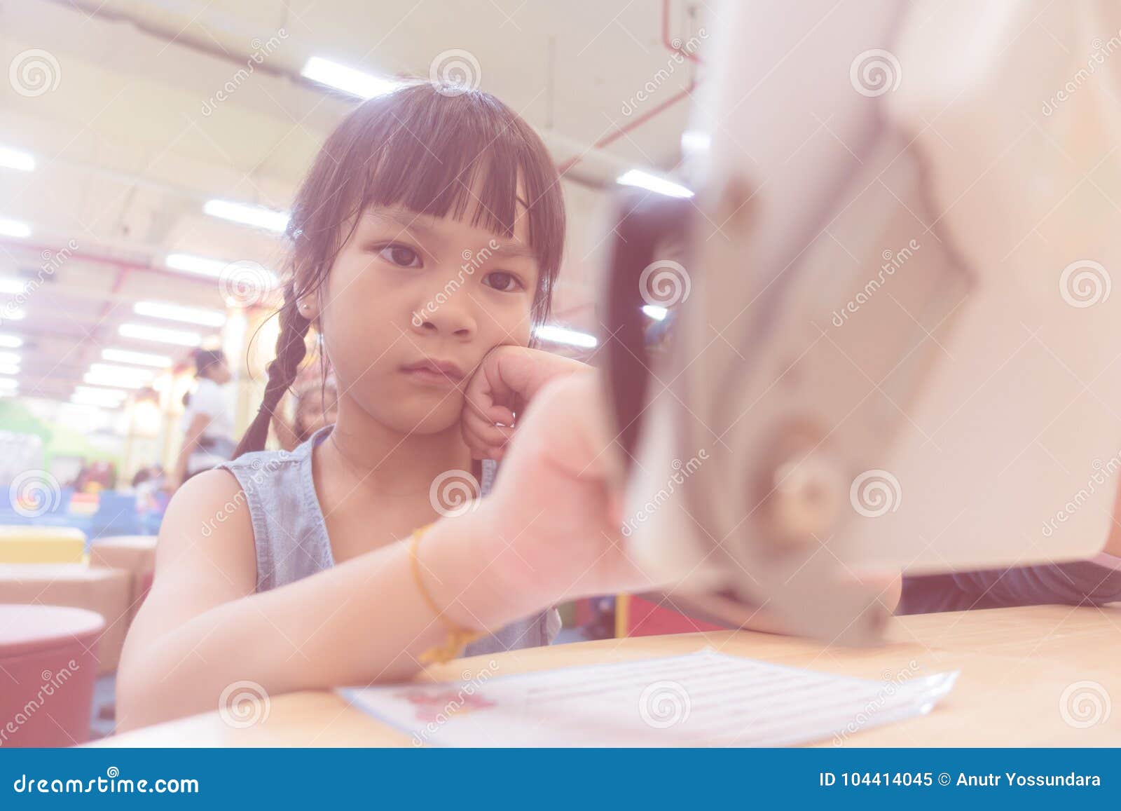 Seroius Girl is Using Tablet in Classroom Stock Image - Image of ...