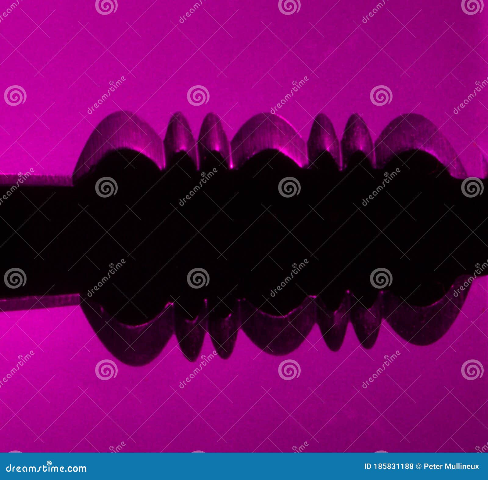 Serrations Of A Knife Reflected In A Shiny Black Surface Royalty-Free ...