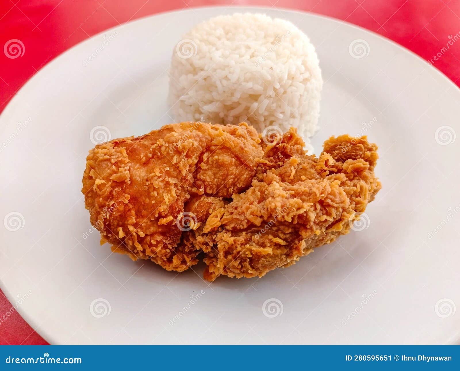 Serve Eating Fried Chicken with White Rice on a White Plate Stock Image ...