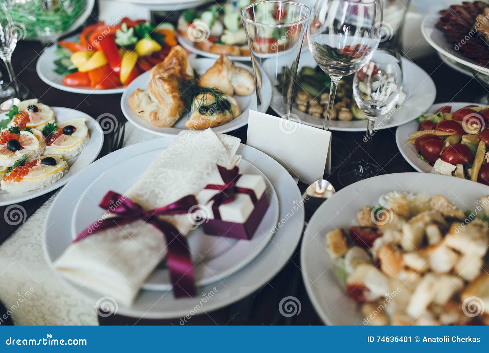 Served banquet table stock image. Image of buffet, plate - 74636401