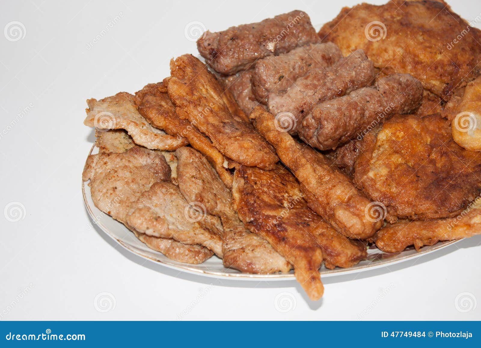 Served Fried Meat on the Plate Stock Photo - Image of dish, closeup ...