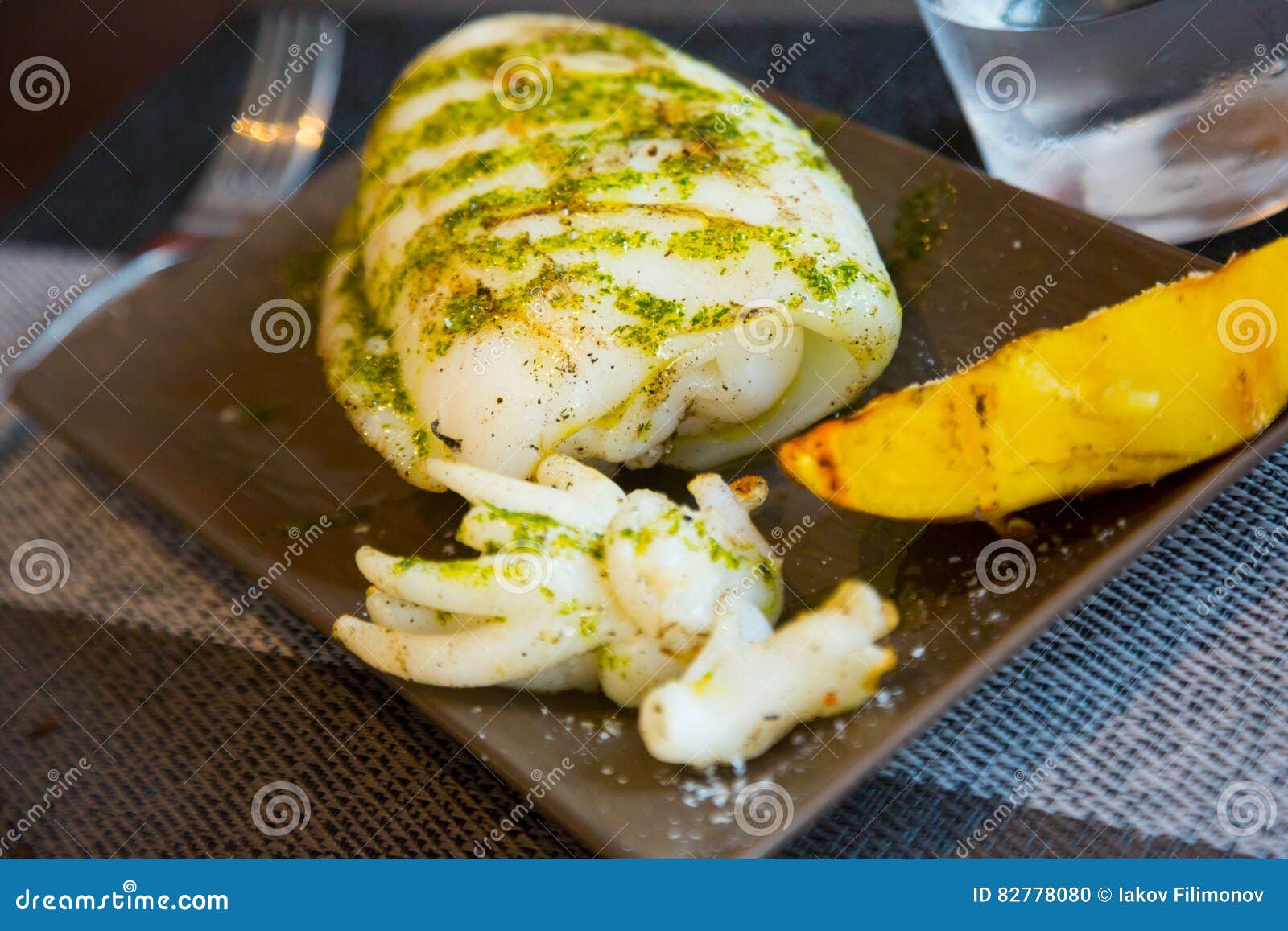 Served roasted cuttlefish stock photo. Image of batata - 82778080