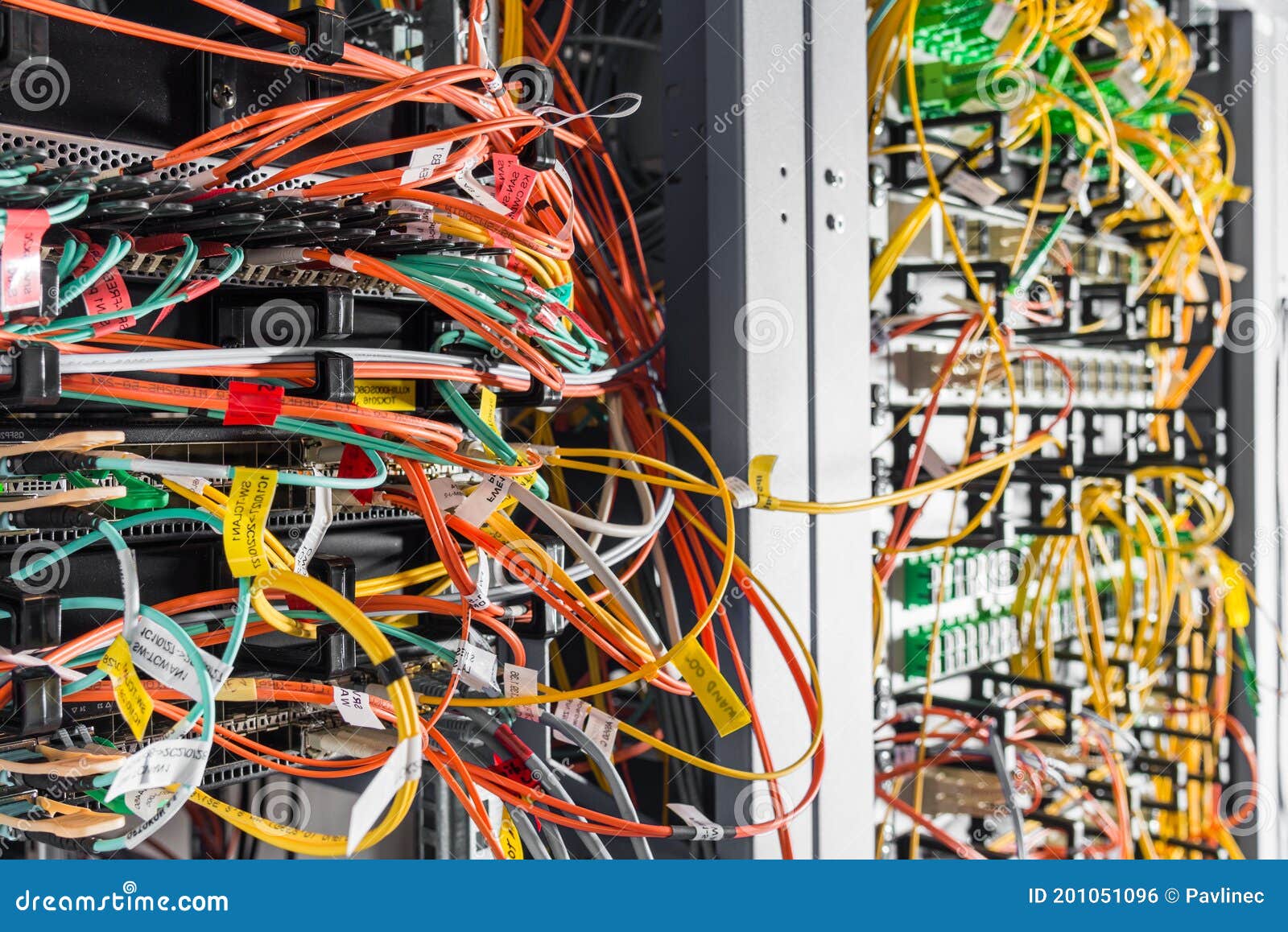 Server Rack with Fiber Optic Cables Attached To Front Panel Swit Stock ...