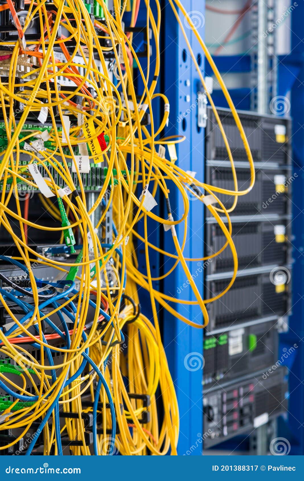 Server Rack with Fiber Optic Cables Attached To Front Panel Swit Stock ...