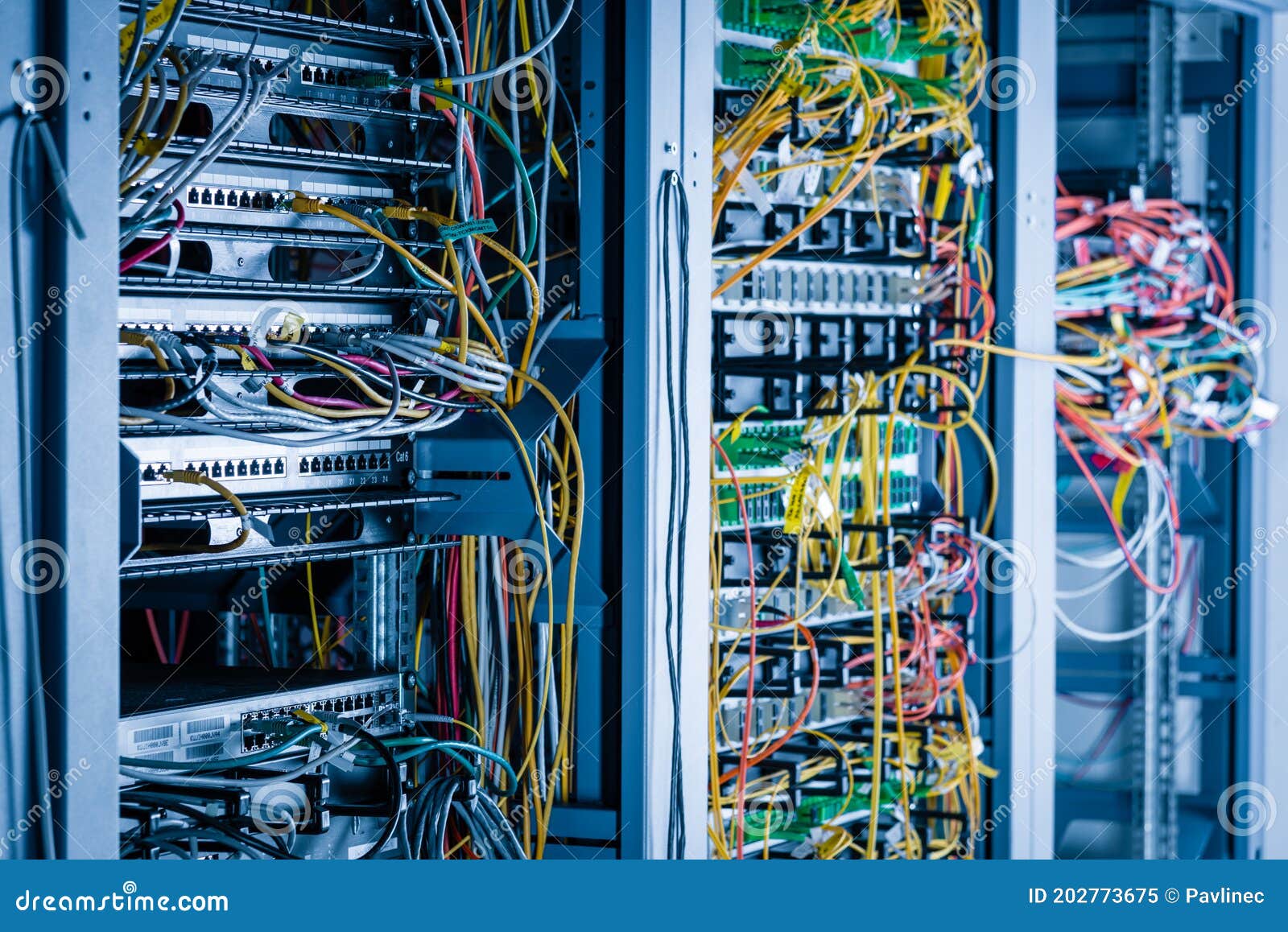 Server Rack with Fiber Optic Cables Attached To Front Panel Swit Stock ...