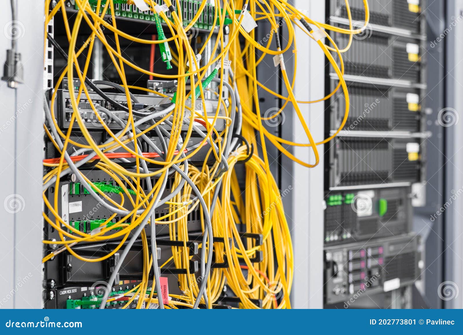 Server Rack with Fiber Optic Cables Attached To Front Panel Swit Stock ...